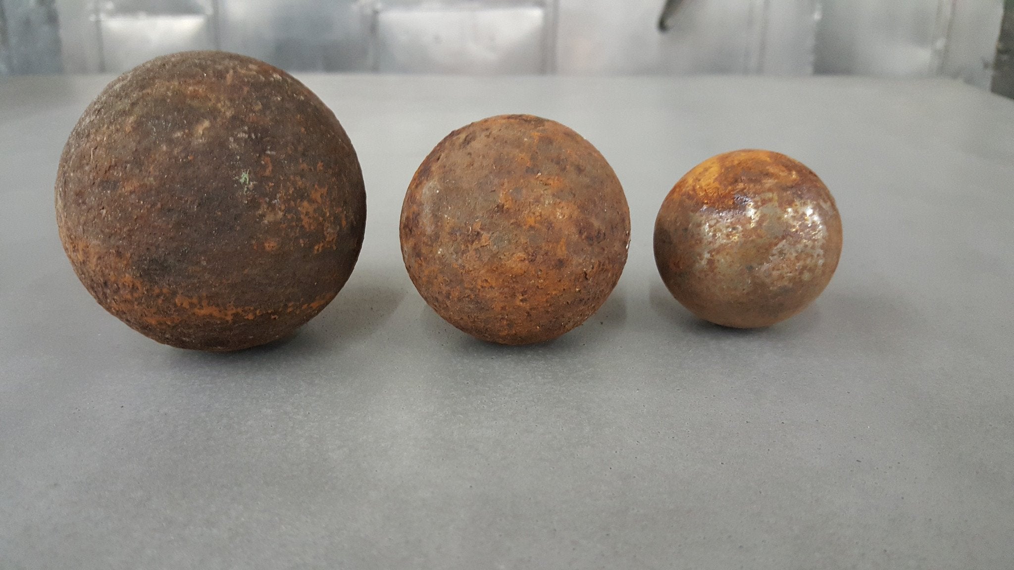Iron Balls – Antiquities Warehouse of Grand Traverse
